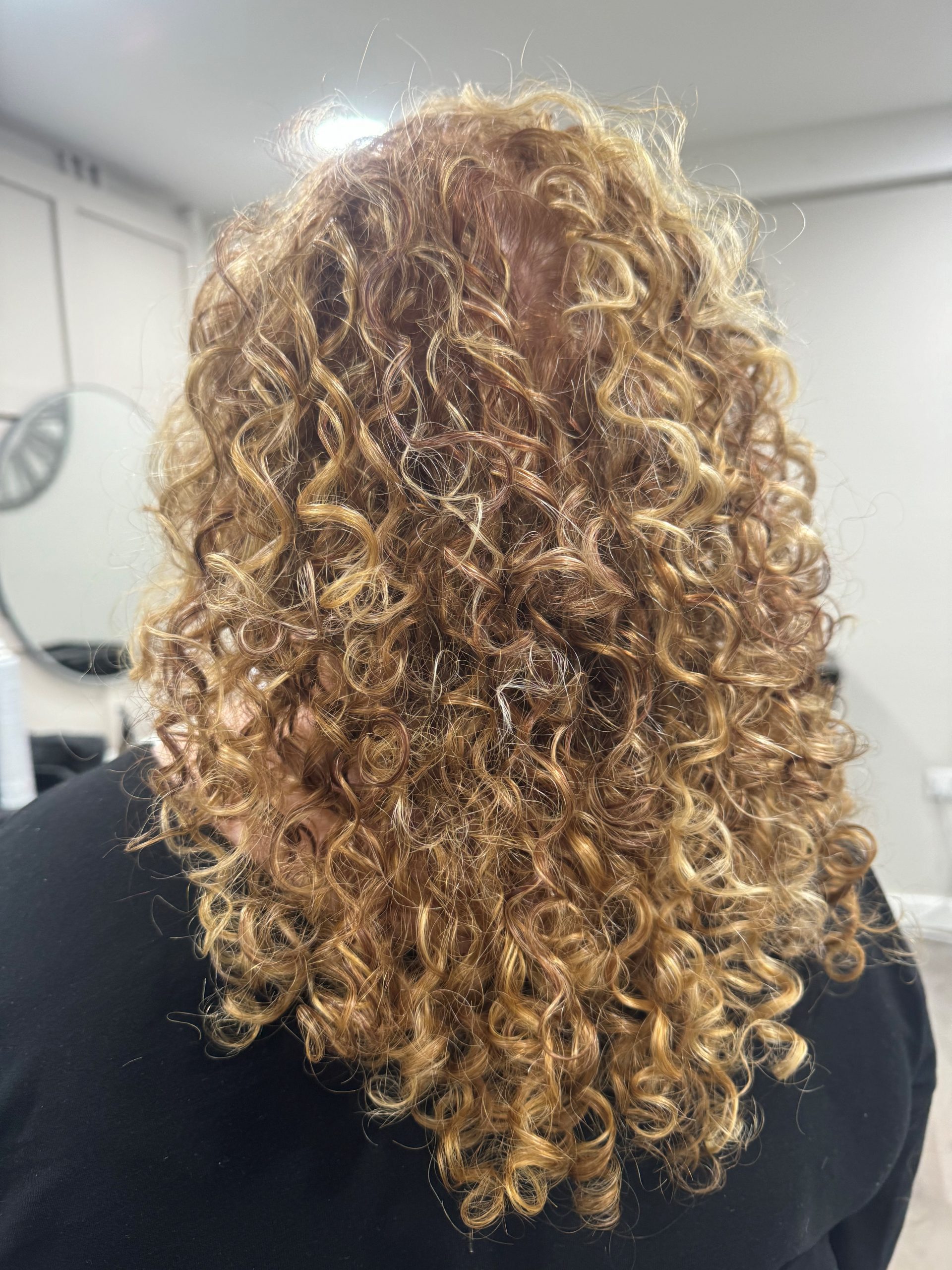 Winterizing Your Curls - Arkitec Hair Design